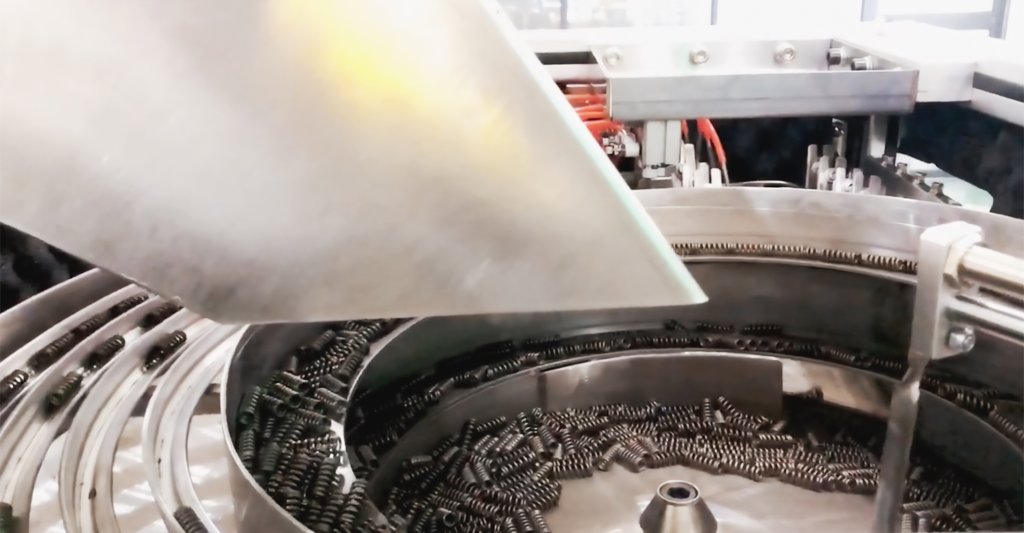 The future of feeding systems in spring grinding | WIRE